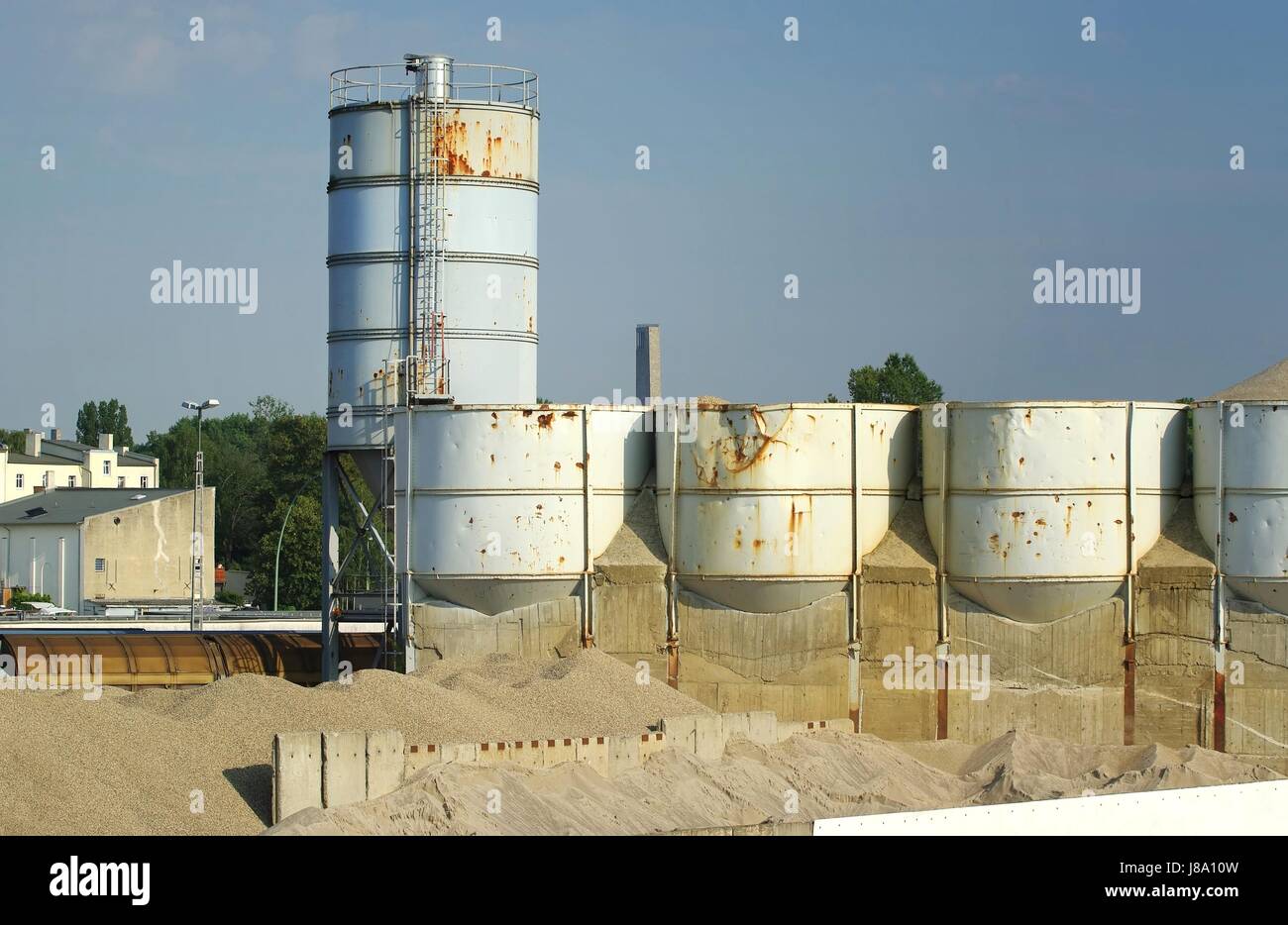 gypsum factory plant with sand mountains Stock Photo - Alamy