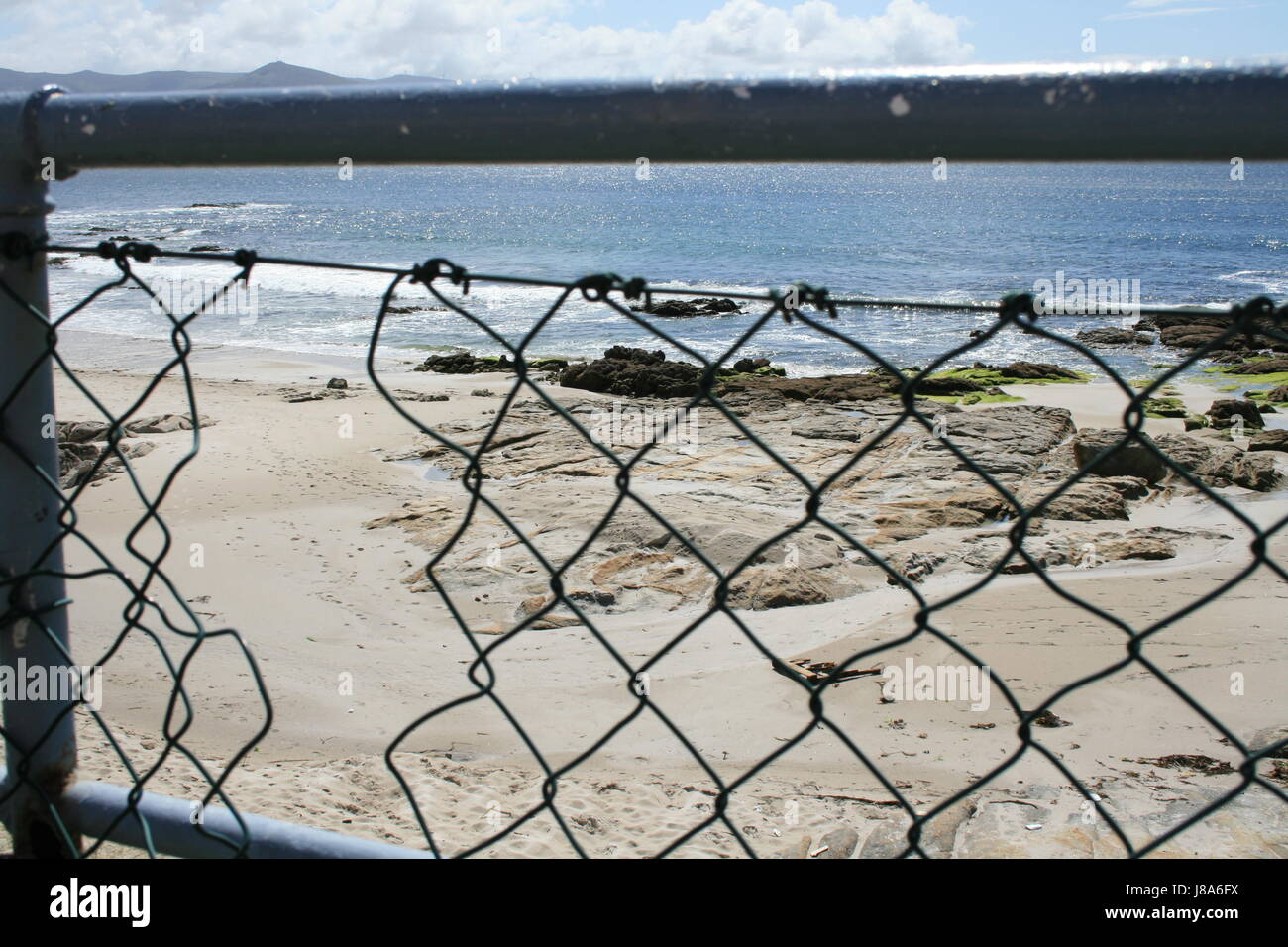 beach, seaside, the beach, seashore, coast, railing, wire, hole, fence ...
