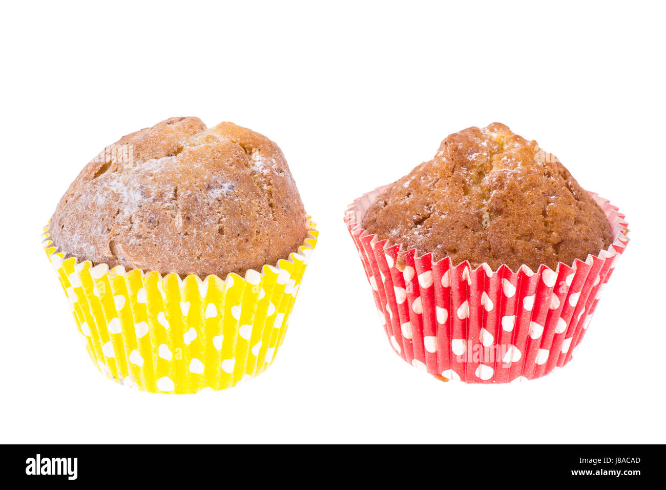 Sweet muffins in paper form on white Stock Photo - Alamy