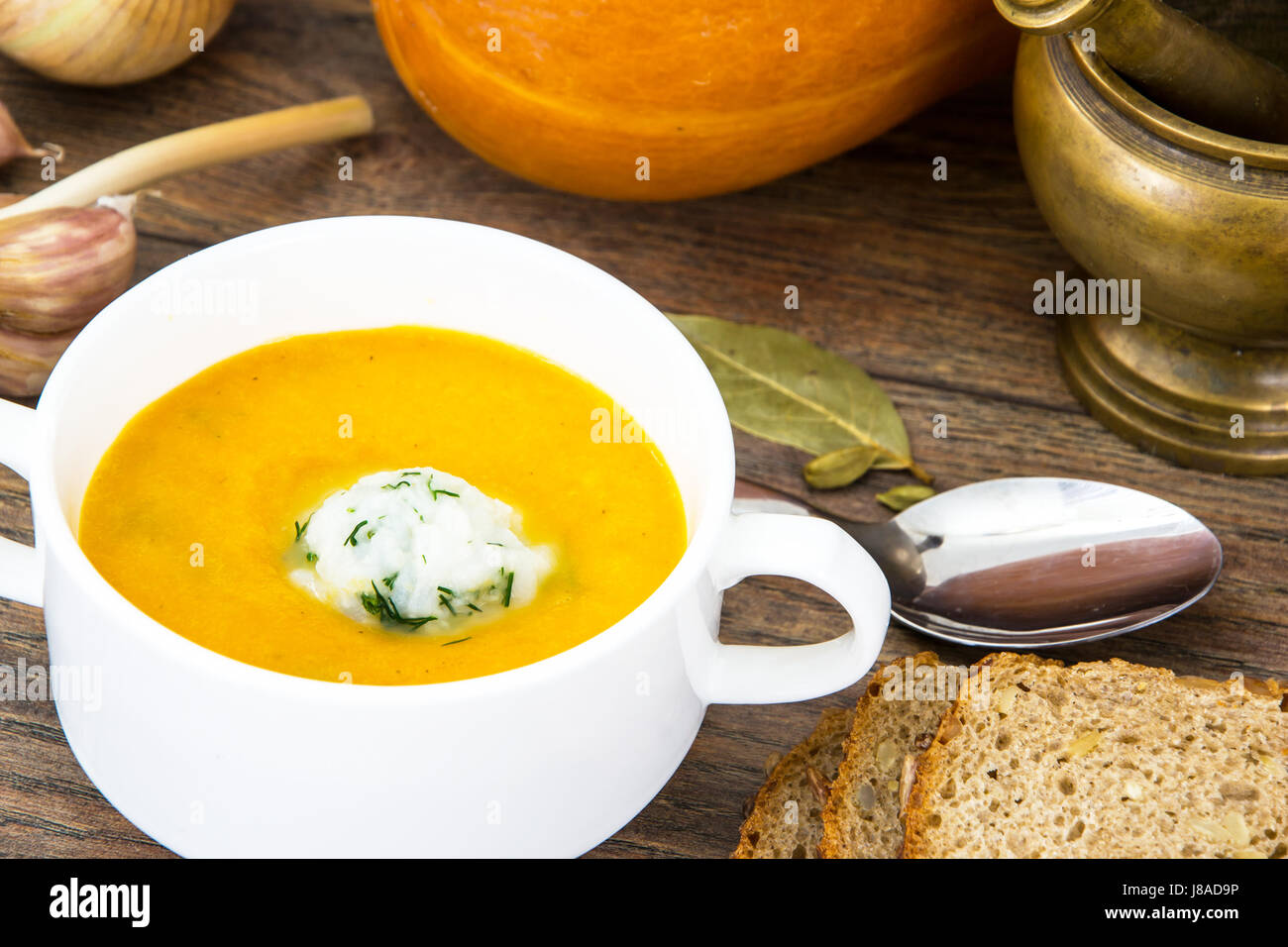Dietary soup puree with rice, carrots and pumpkin Stock Photo - Alamy