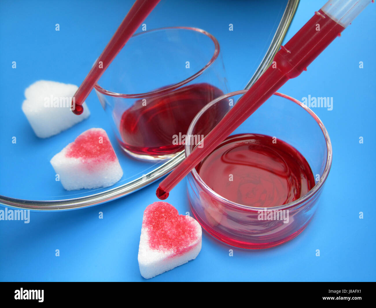 red sugar heart Stock Photo - Alamy