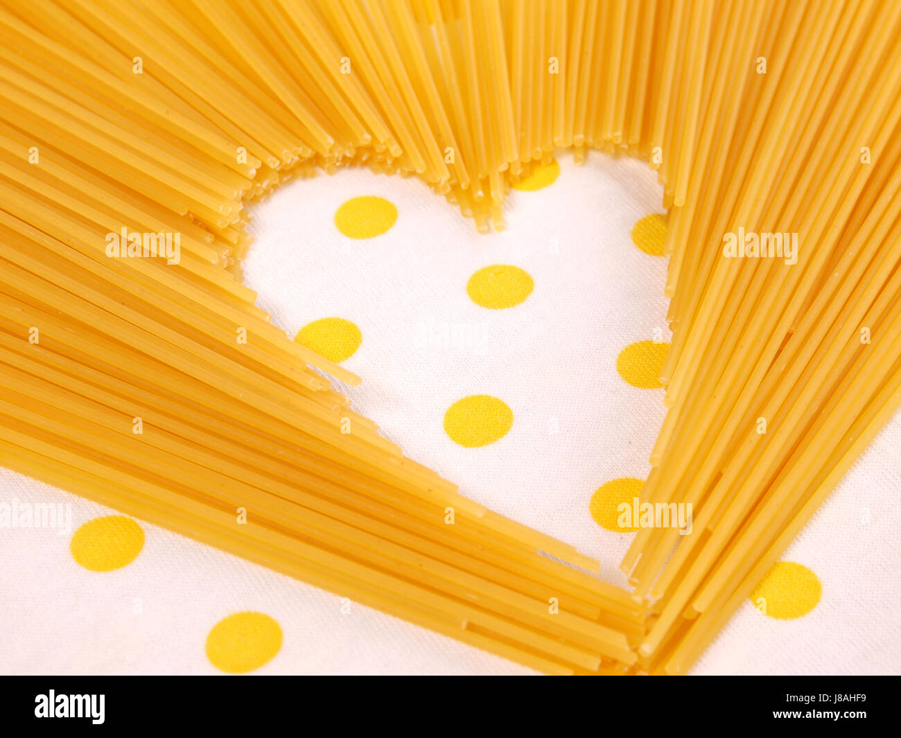 pasta background with spaghetti and dots Stock Photo - Alamy