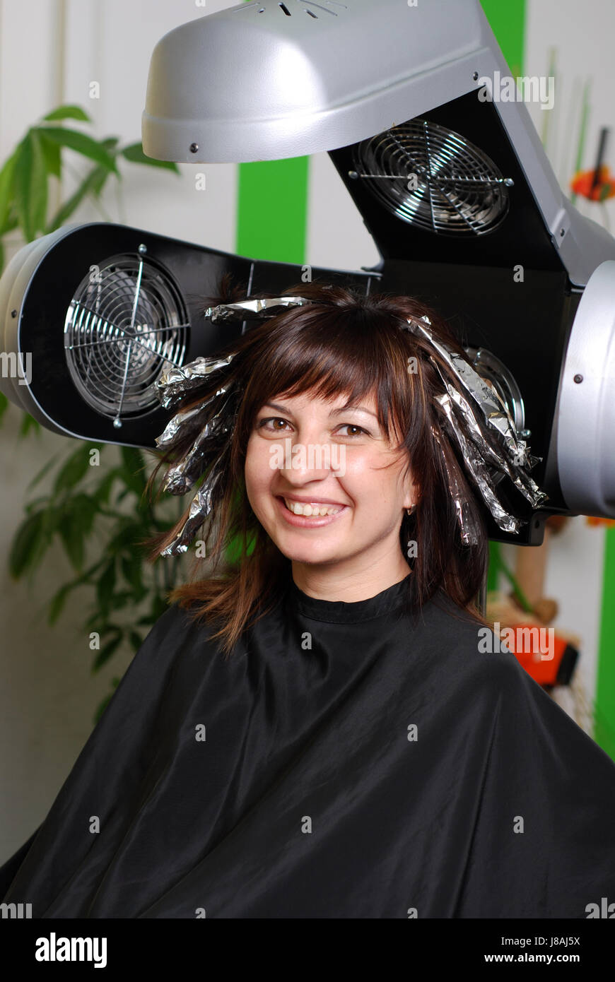 Woman under hair dryer hi-res stock photography and images - Alamy