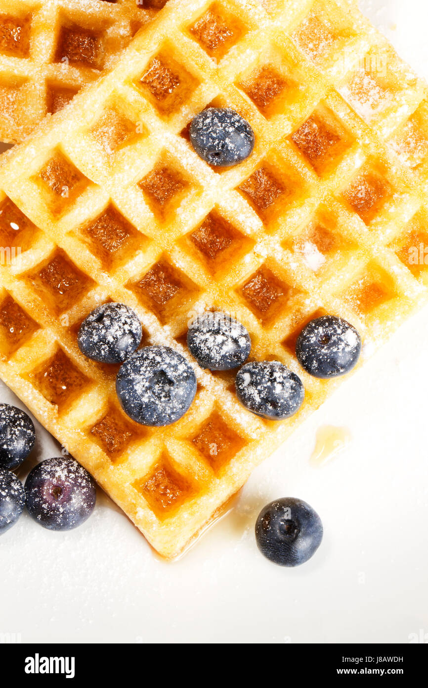 waffles with sugared blueberries and syrup Stock Photo - Alamy