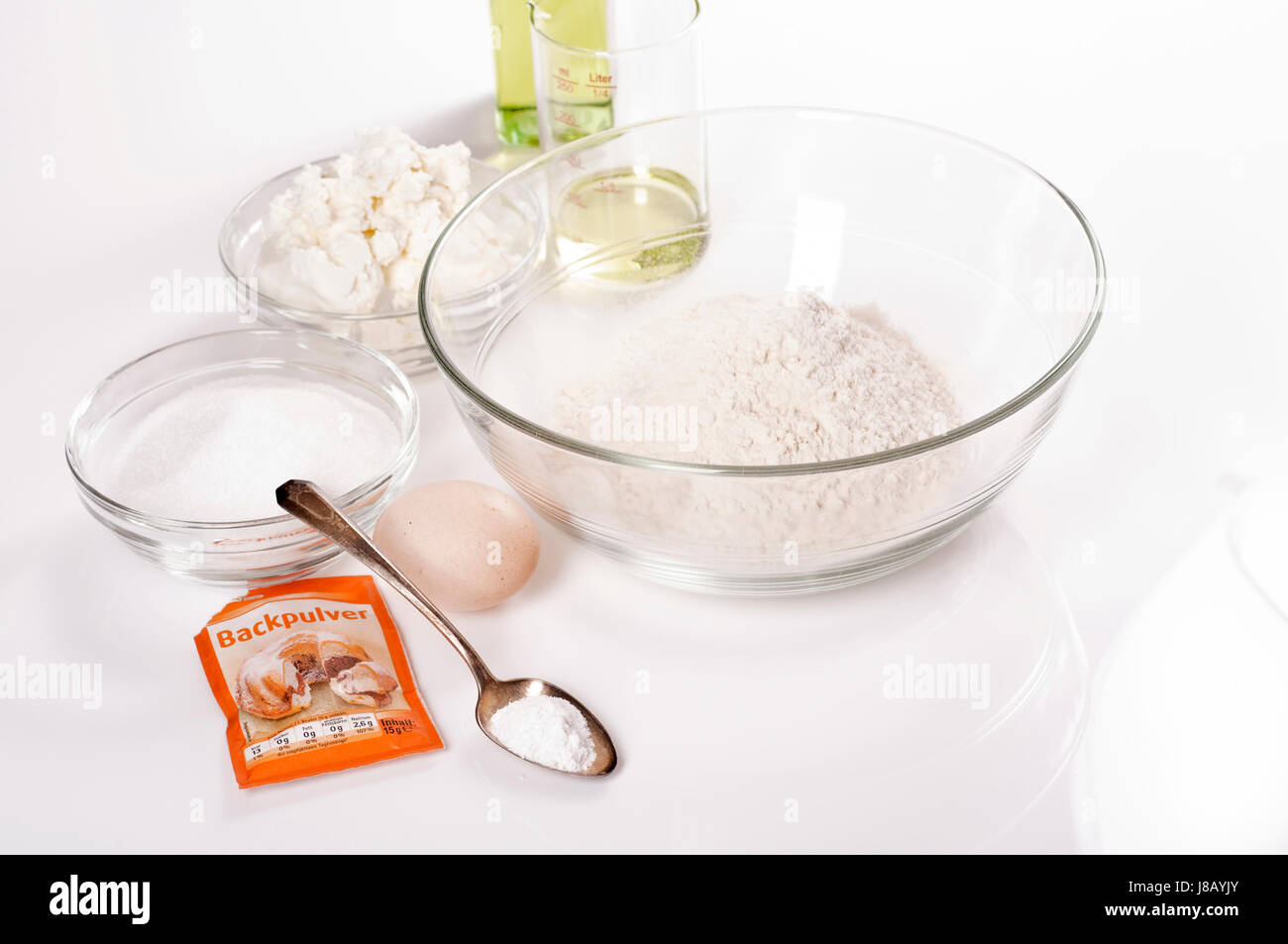 ingredients for quark-oil dough on a white background Stock Photo - Alamy