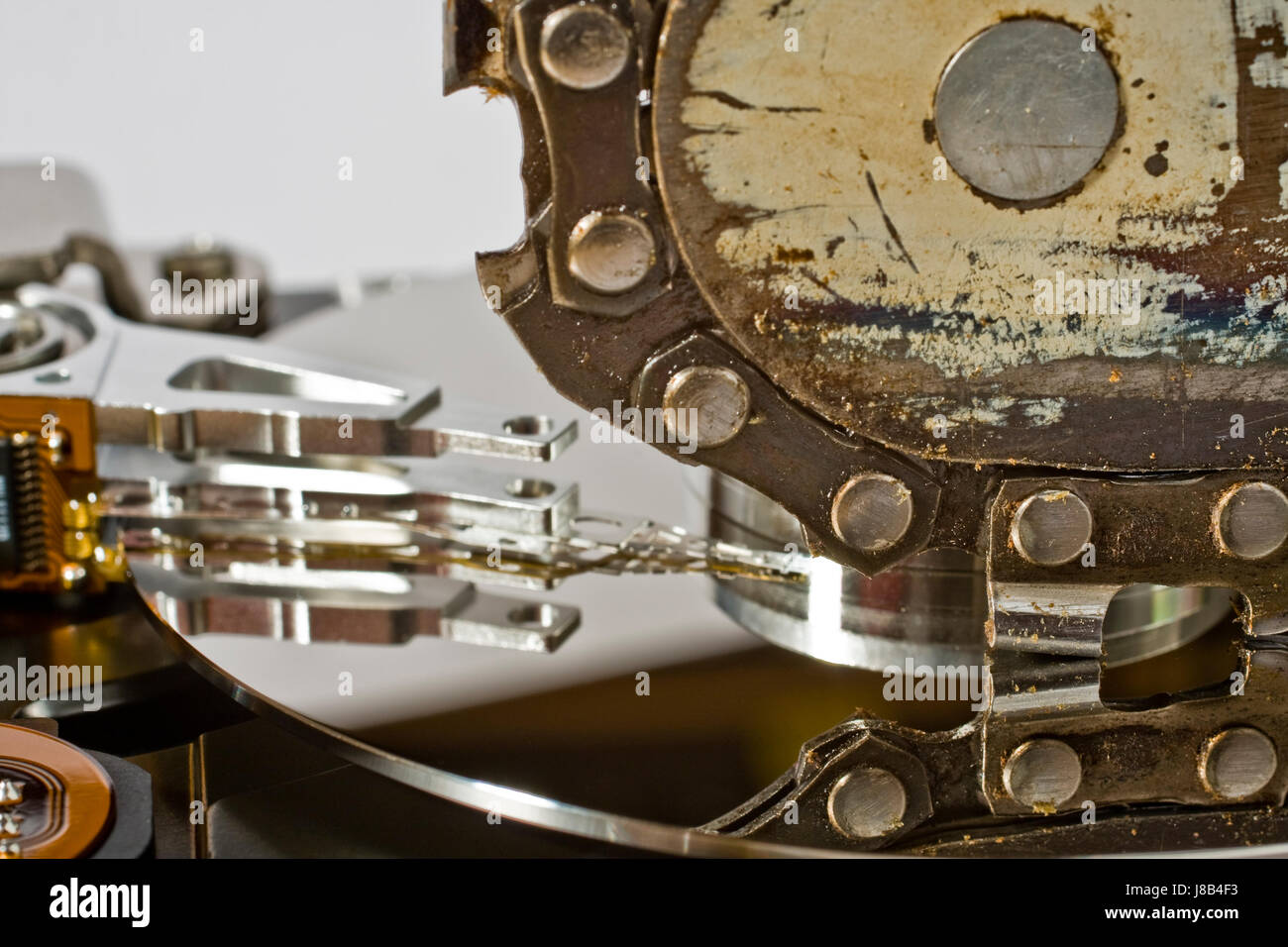 chain saw and hard drive Stock Photo - Alamy