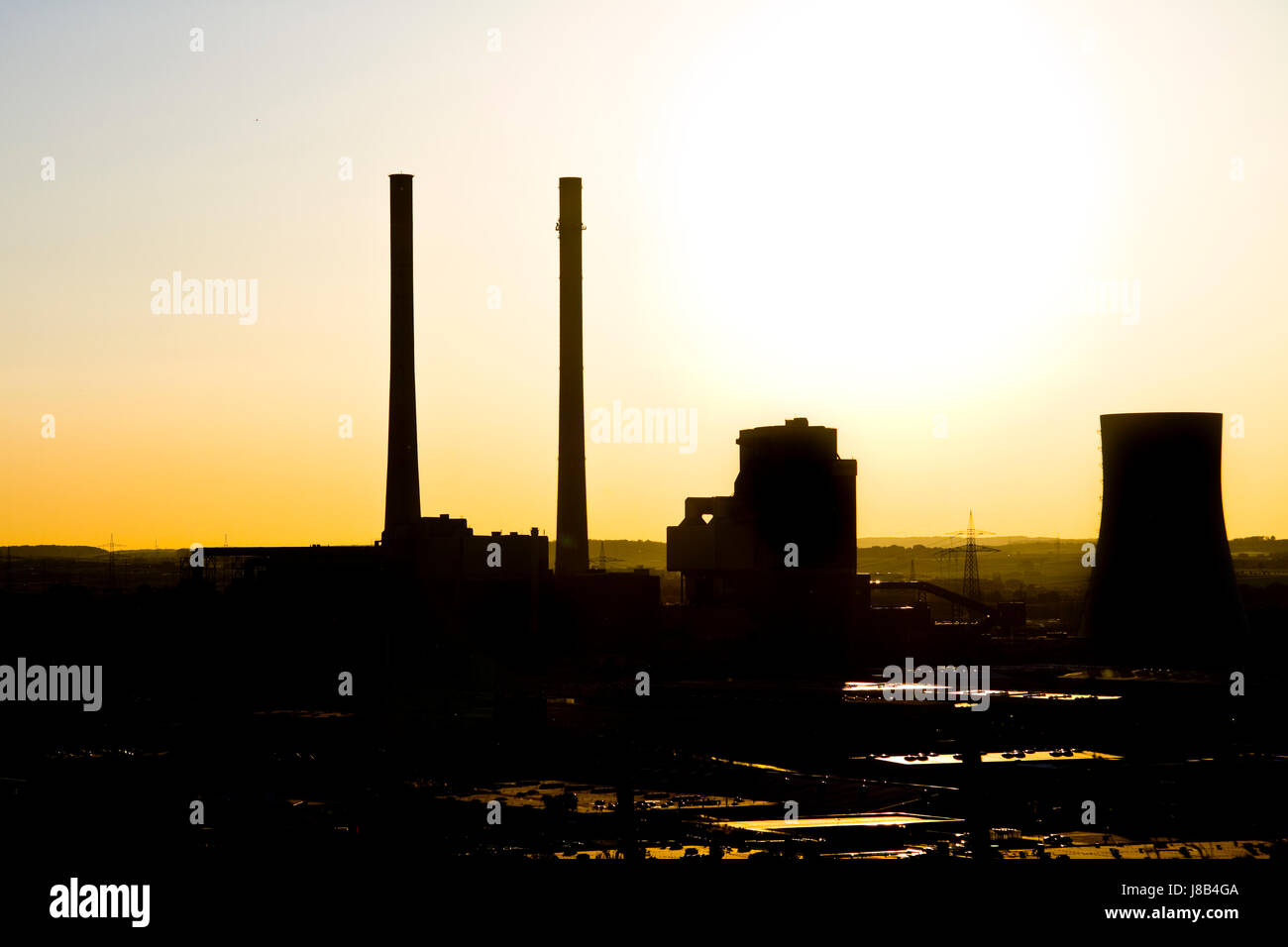 sunset over power plant Stock Photo - Alamy