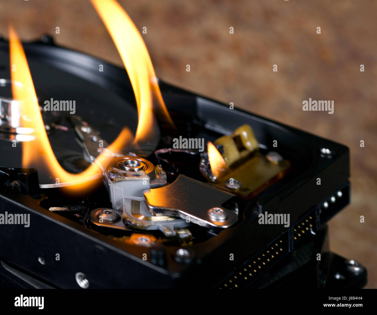 flames on open harddrive Stock Photo - Alamy
