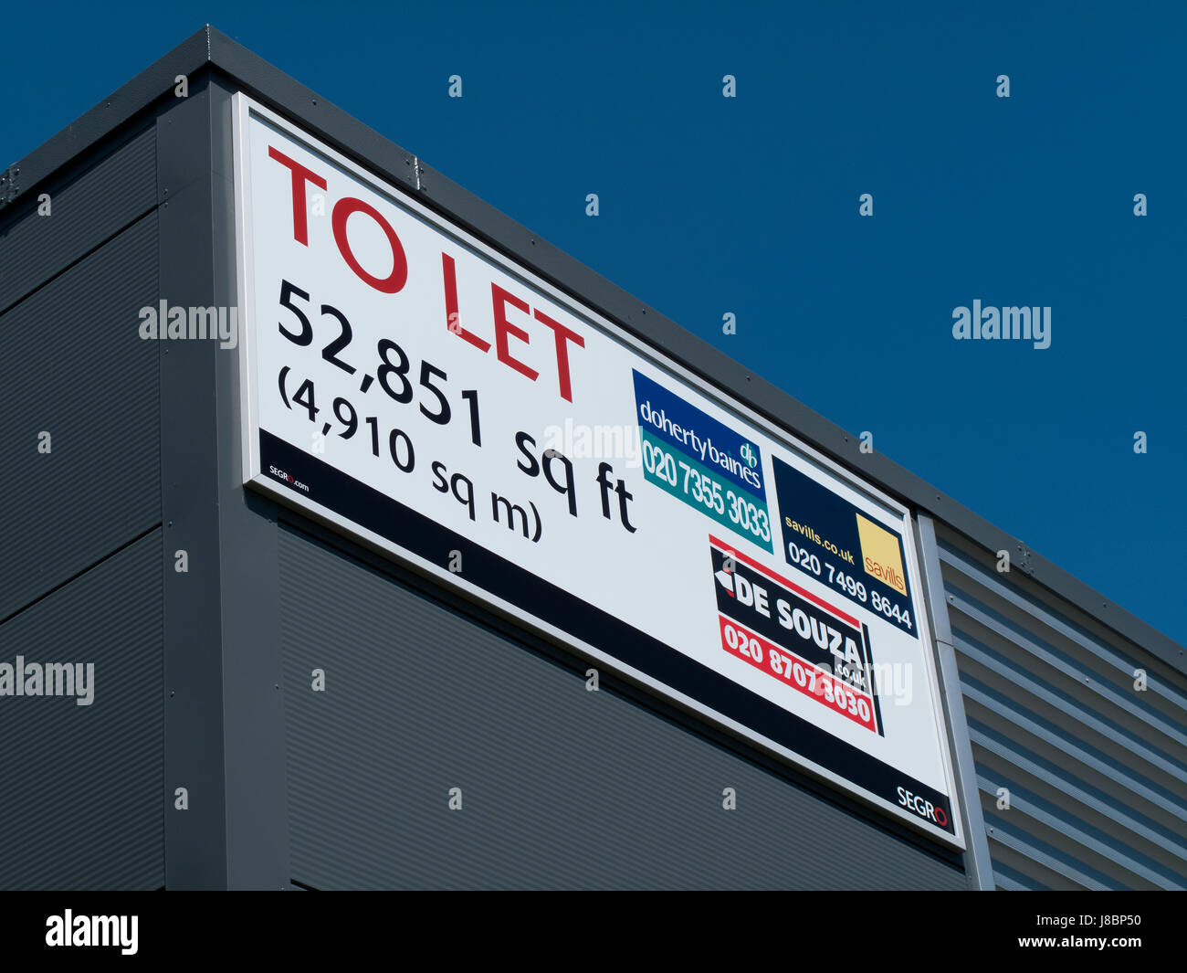 Estate agents industrial warehouse and office units to let sign Stock ...