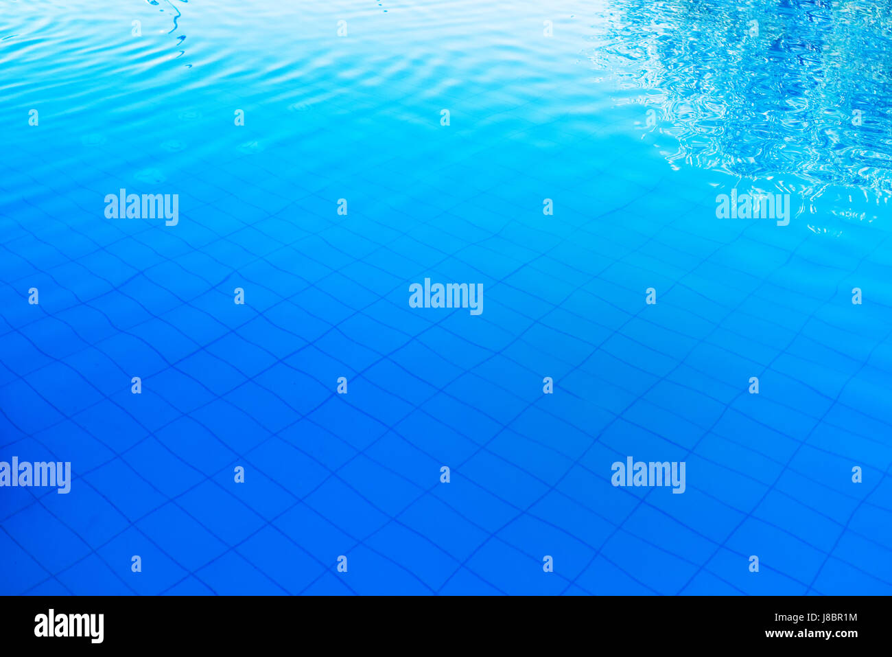 Blue outdoor poolside water surface as abstract background for summer ...