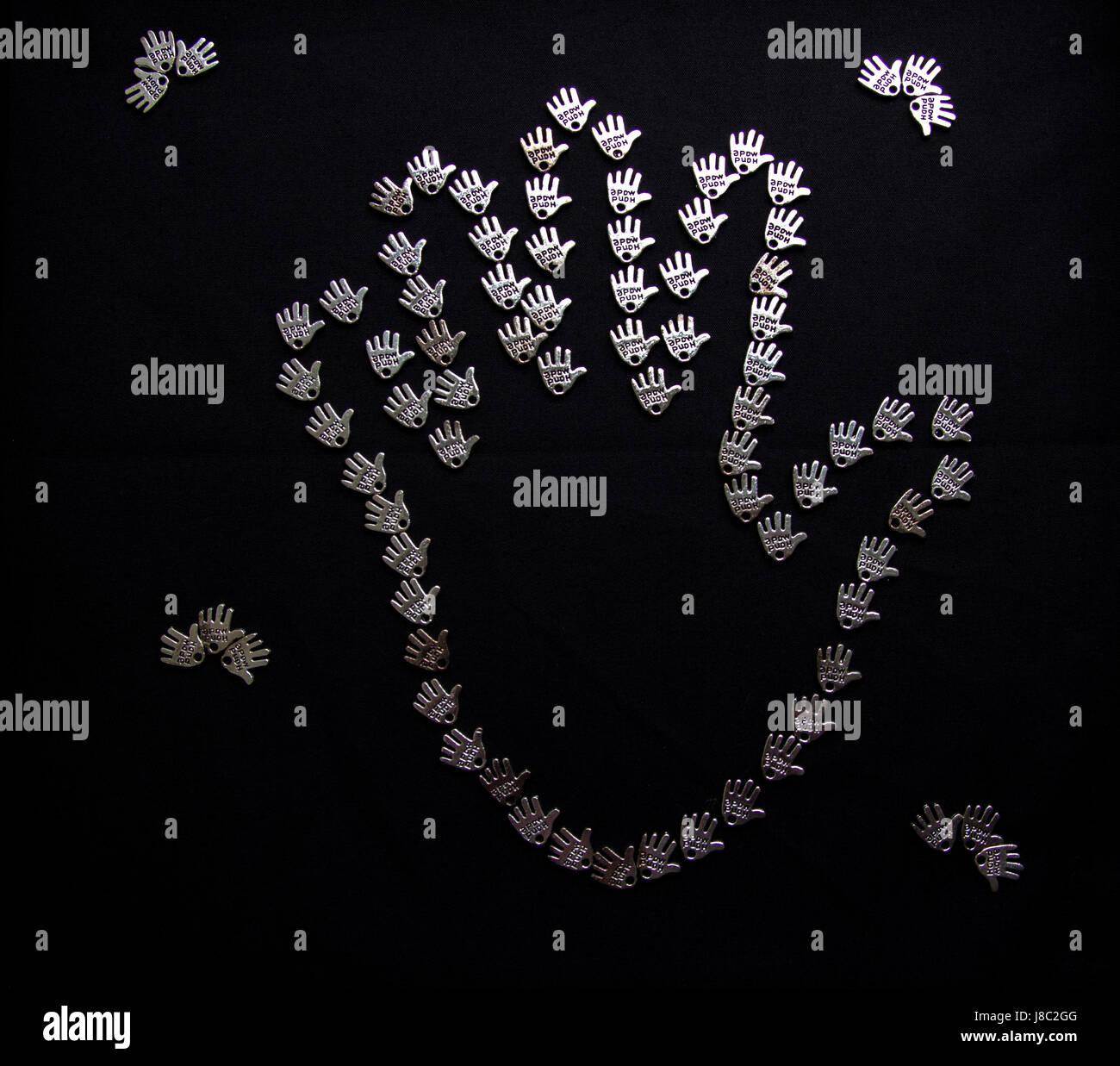 hand shape made from charms Stock Photo - Alamy