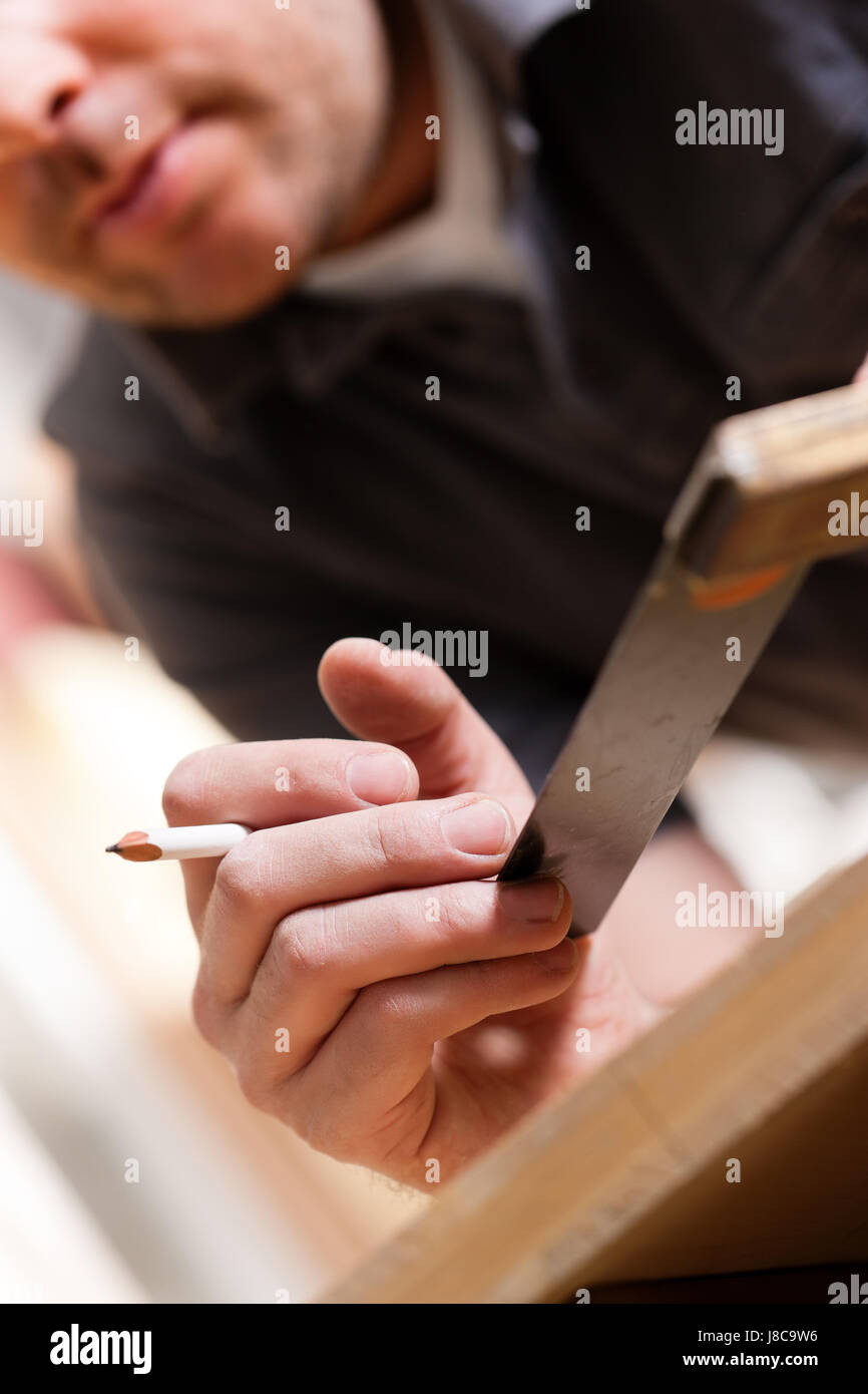 joiners or carpenters with stop bracket and pencil Stock Photo - Alamy