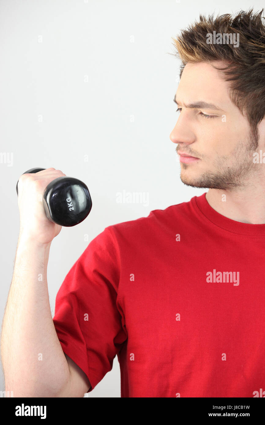 Alternate dumbbell hi-res stock photography and images - Alamy