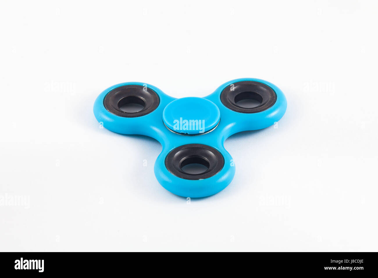 Fidget Spinner in isolated background for stress release during work ...