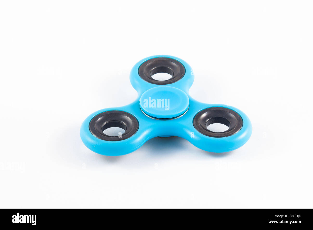 Fidget Spinner in isolated background for stress release during work ...