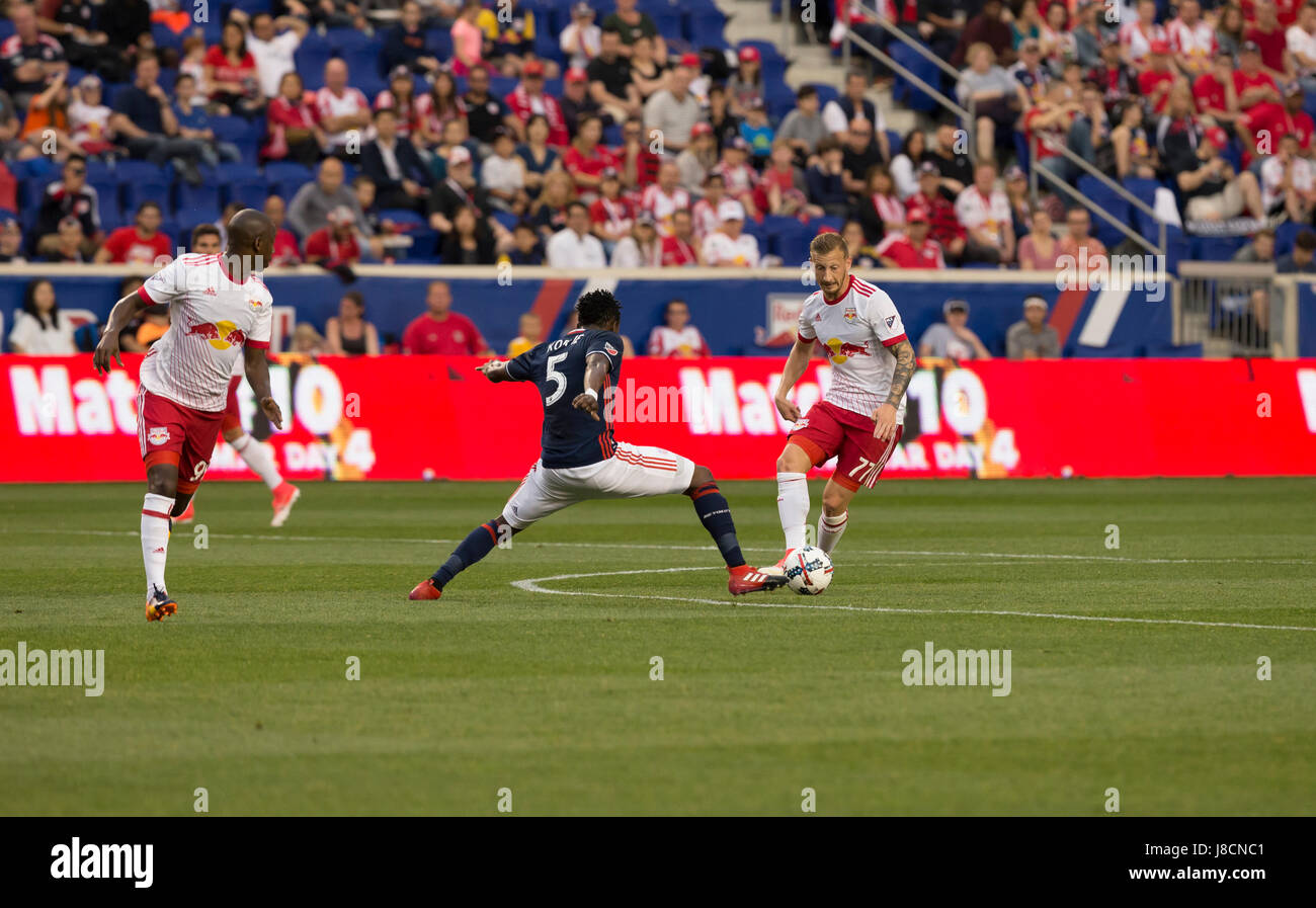 Daniel Royer (77) of New England Revolution controls ball during MLS ...