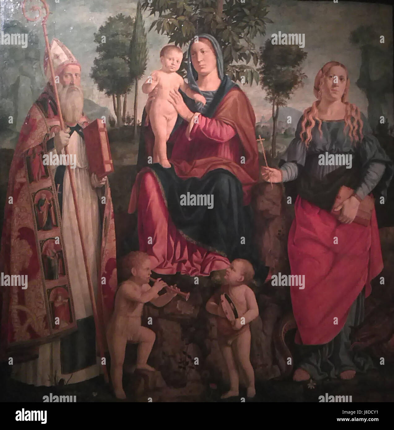 This artwork by Bernardino Luini depicts the Madonna and Child, a theme ...