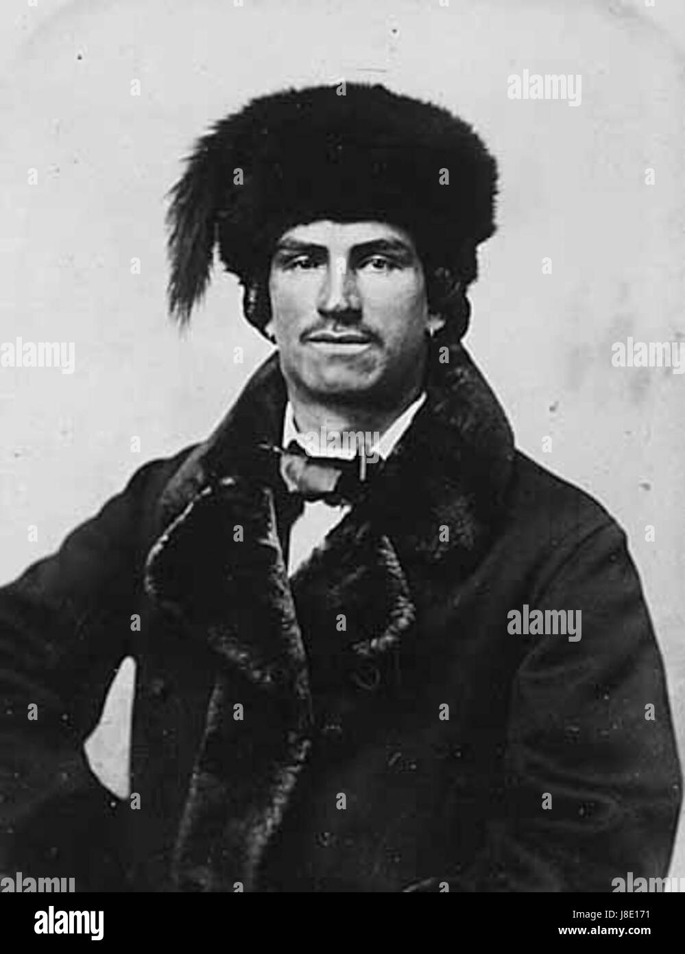 This historical image depicts a mixed-blood fur trader in the late 19th ...