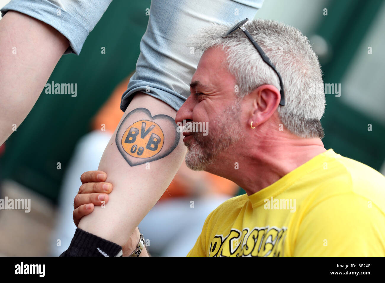Dortmund, Germany. 28th May, 2017. Heinz Ruediger kisses a BVB tattoo ...
