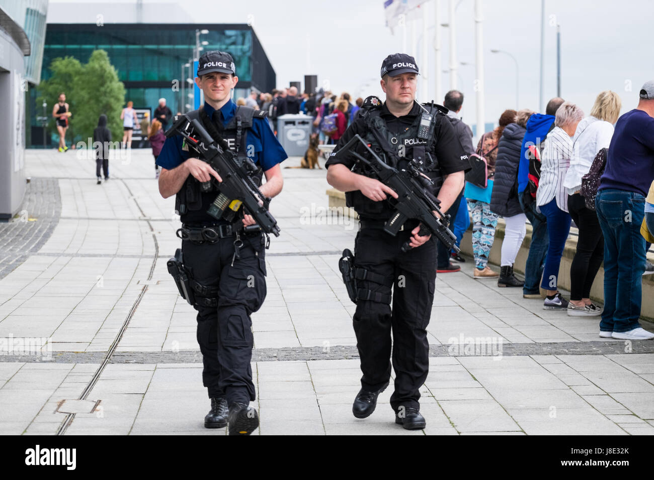 Liverpool, UK. 28th May, 2017. Armed Police patrolling near the finish ...