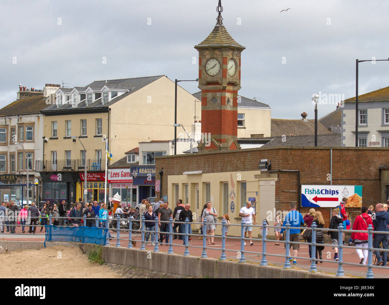 Morecambe Bay Clock Tower, Lancashire, UK. May sunshine breaks through ...