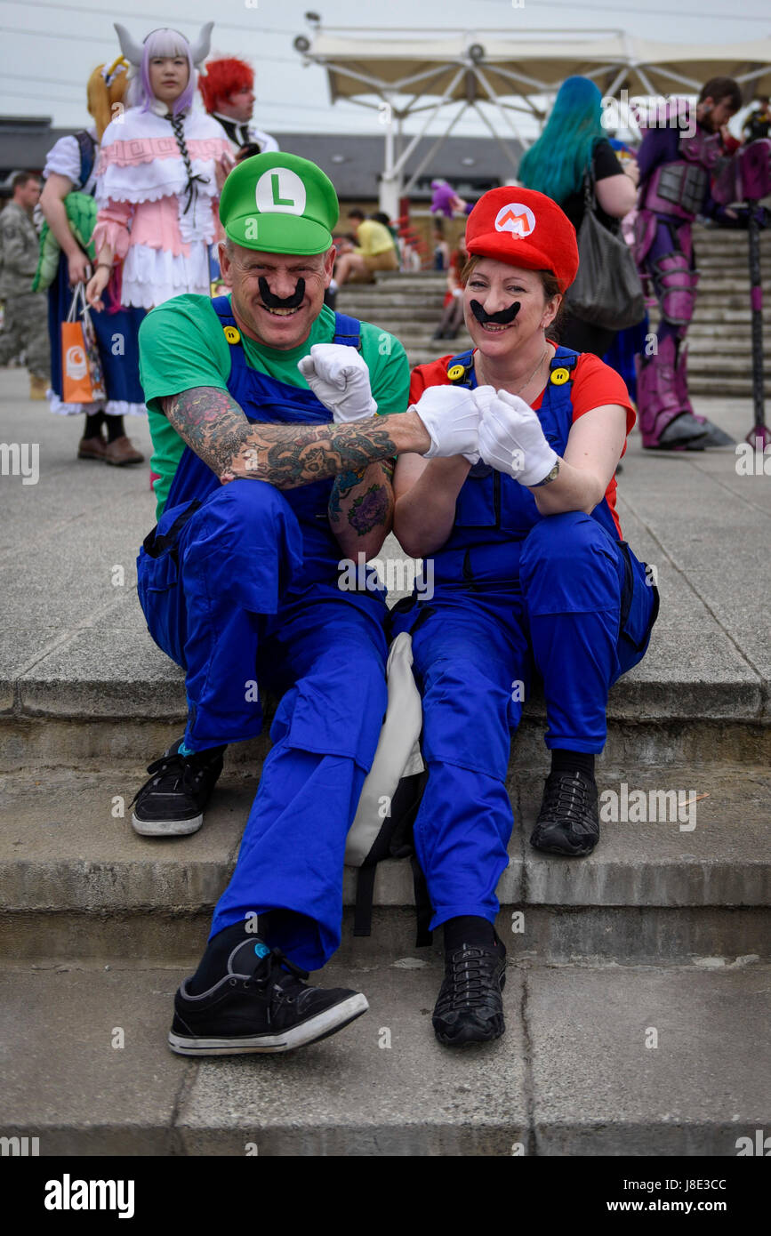 London, UK. 28th May, 2017. A couple dressed as Luigi and Mario at MCM ...