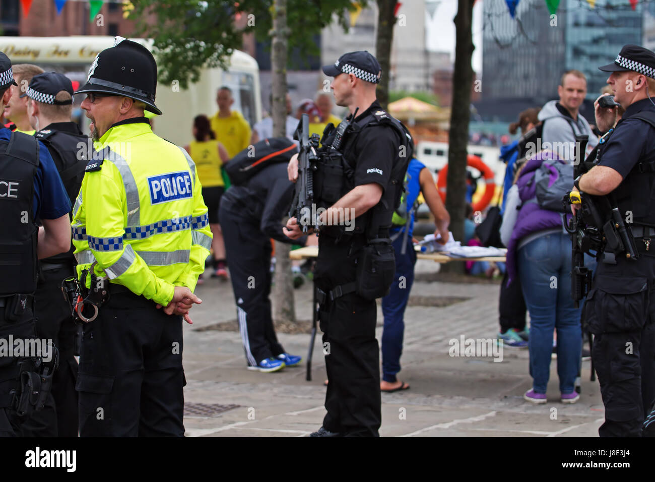 Liverpool, UK. 28th May, 2017. Armed Police mingle with the crowd at ...