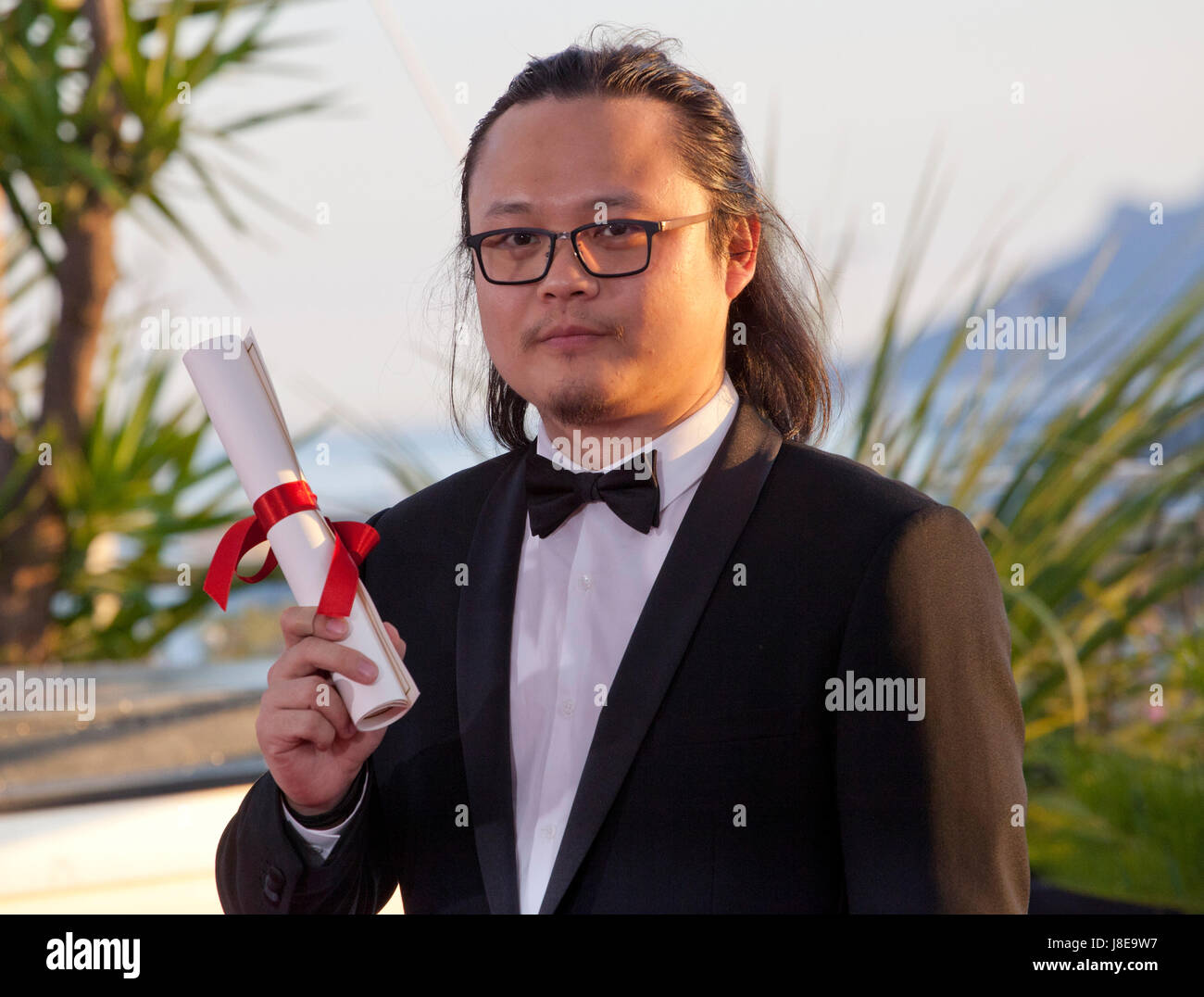 Cannes, France. 28th May, 2017. Director Qiu Yang, winner of the award ...
