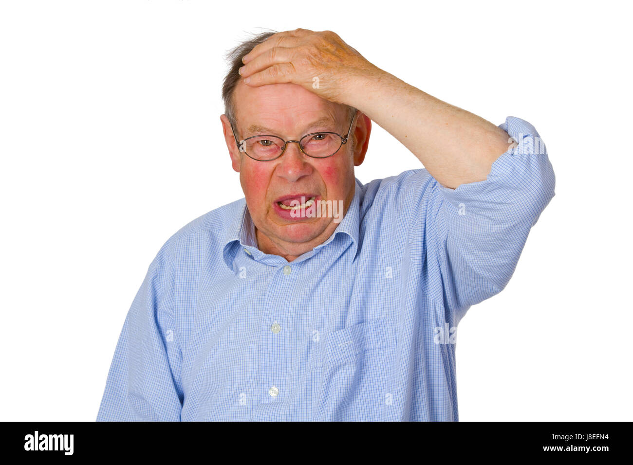 senior holds hand on forehead Stock Photo - Alamy