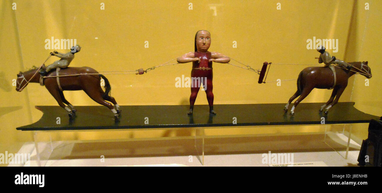 Louis Cyr retenant deux chevaux 01 Stock Photo - Alamy