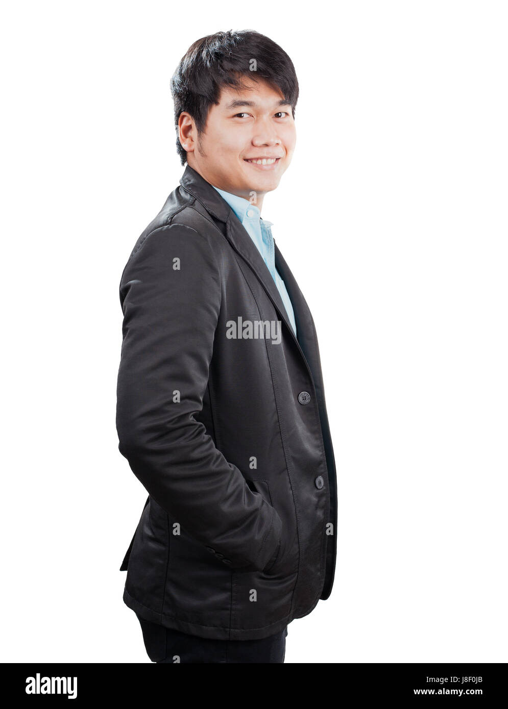 portrait side view of young asian man with western suit standing and ...