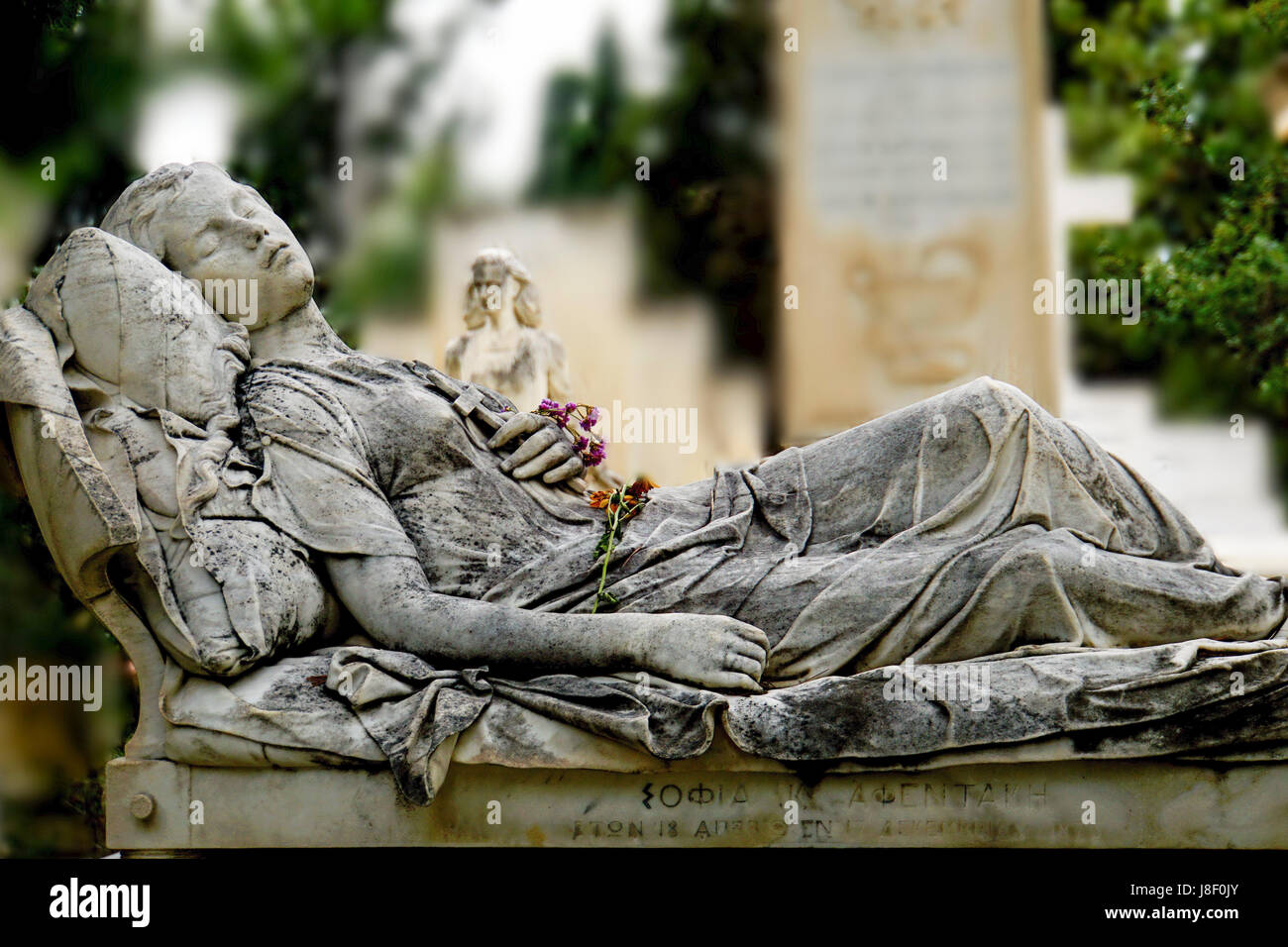 Reclining woman statue in a cemetery, Athens, Greece Stock Photo - Alamy