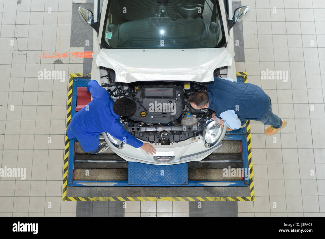 checking the broken car Stock Photo - Alamy