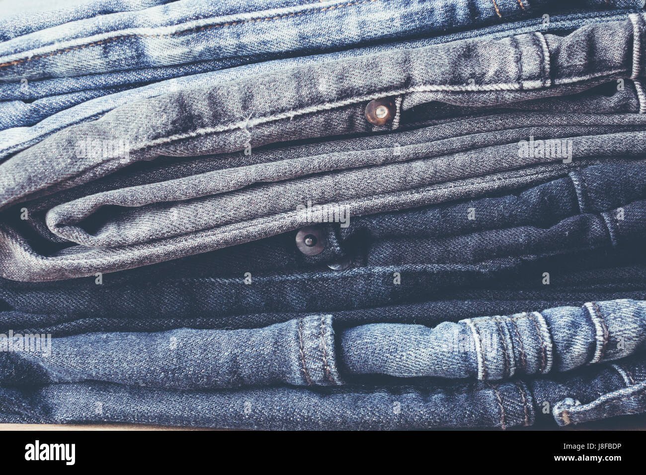 jeans fashion Background different denim layers colors Stock Photo - Alamy