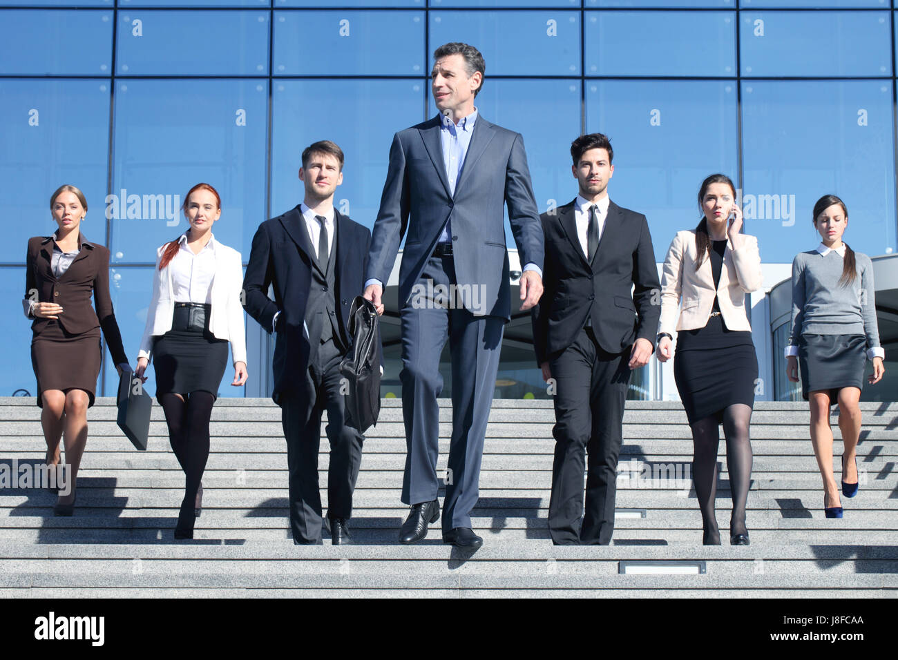 Businessman woman walking company hi-res stock photography and images ...