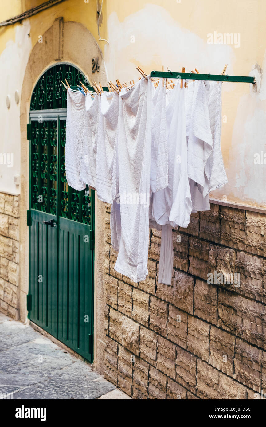 Laundry drying in the street hi-res stock photography and images - Alamy