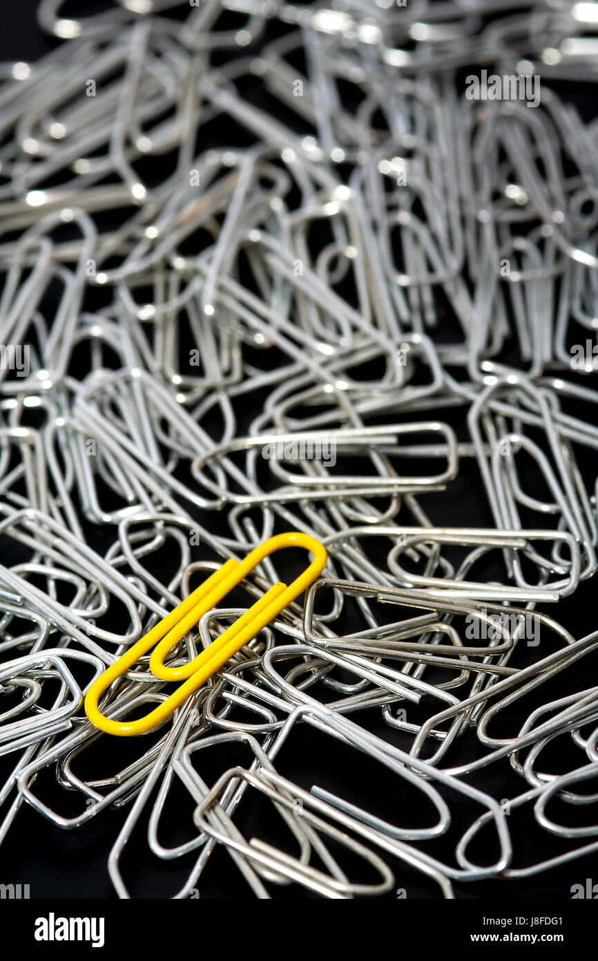 yellow paper clip Stock Photo - Alamy