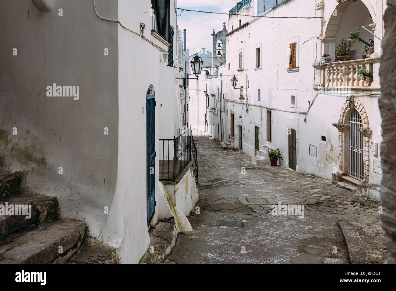A typical street in Ostuni, Puglia, Italy Stock Photo - Alamy