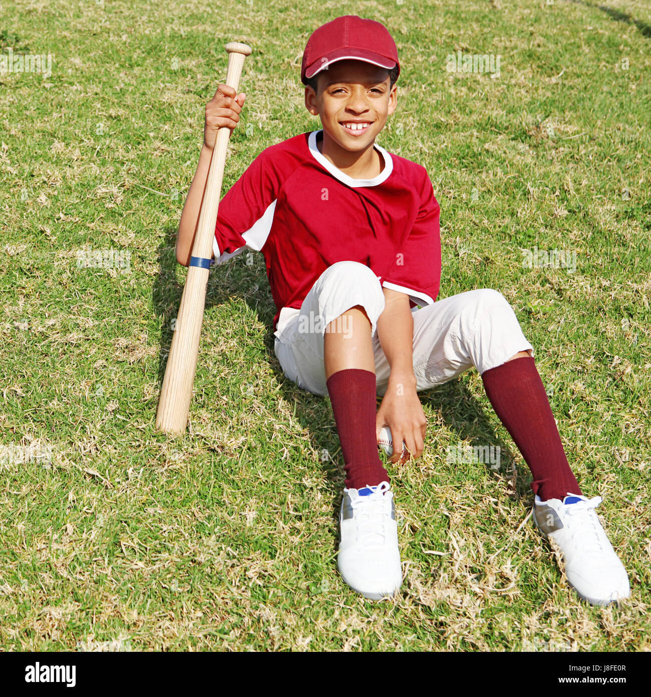 African boy baseball player hi-res stock photography and images - Alamy