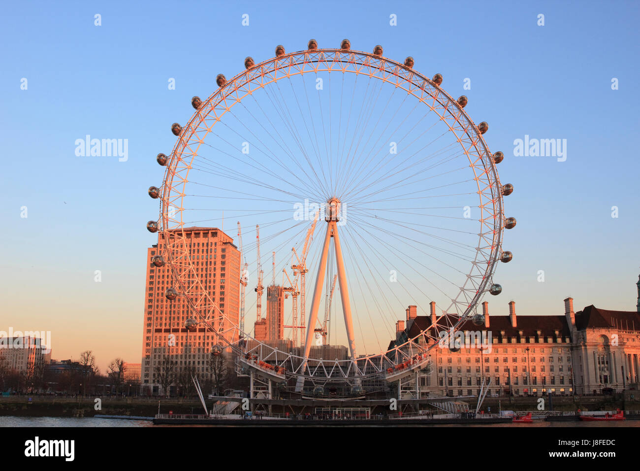 London Eye Ferris Wheel in Golden sunlight Stock Photo - Alamy
