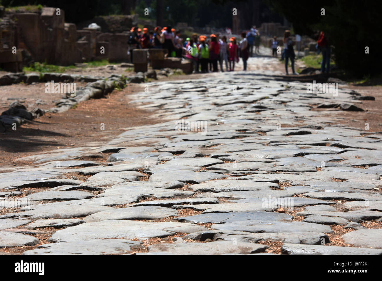 An old Roman road in Ostia Antica, just outside Rome,Italy Stock Photo ...