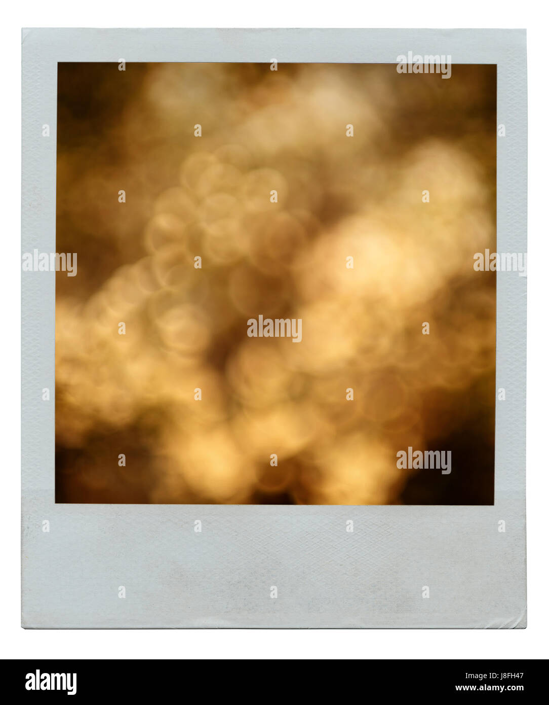 Instant film frame with abstract golden background Stock Photo - Alamy