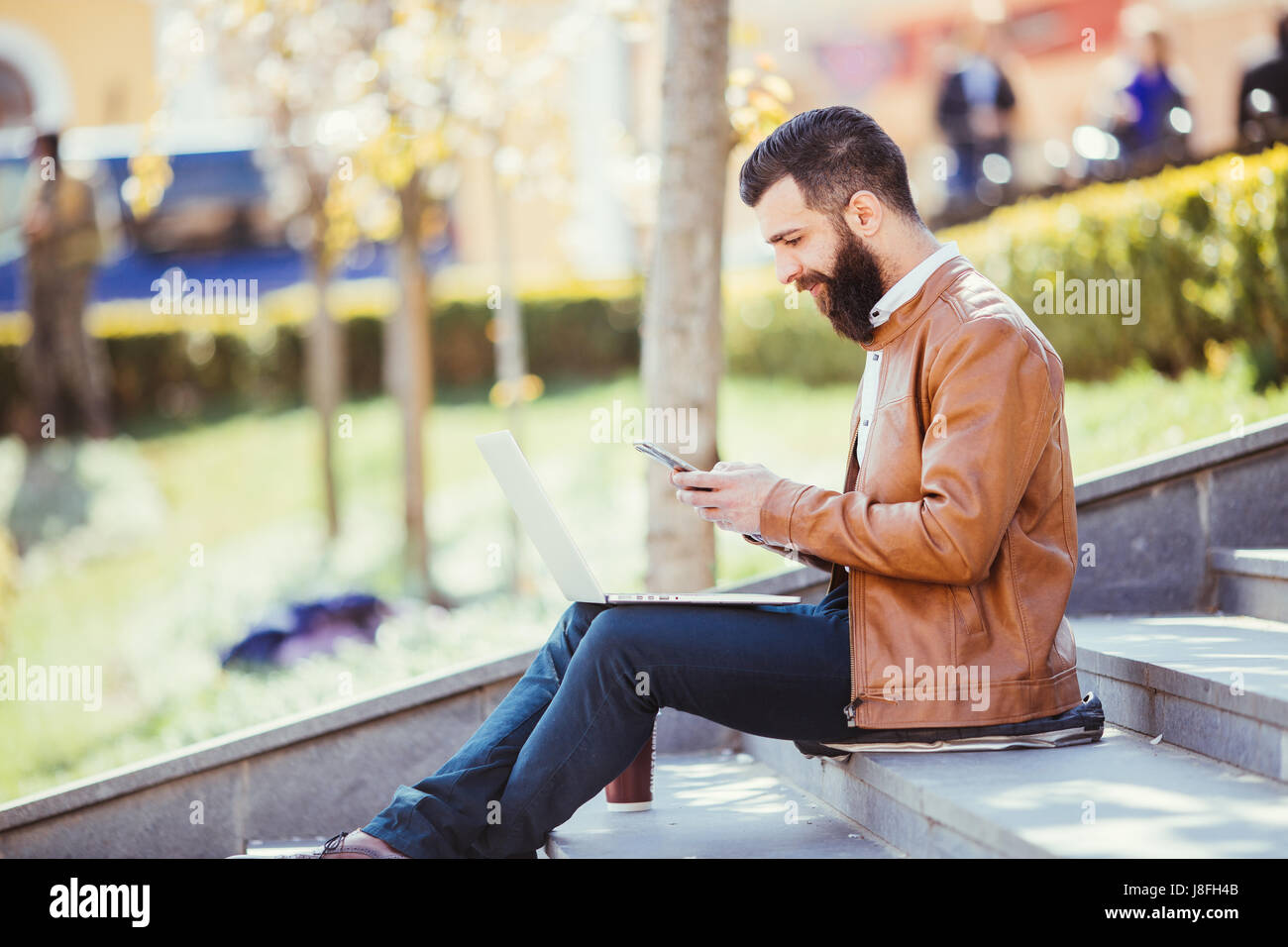 Adult talking teenager outside building hi-res stock photography and ...