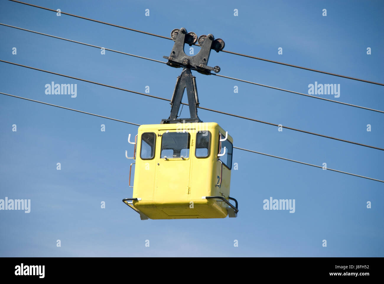 yellow gondola - cable car Stock Photo - Alamy