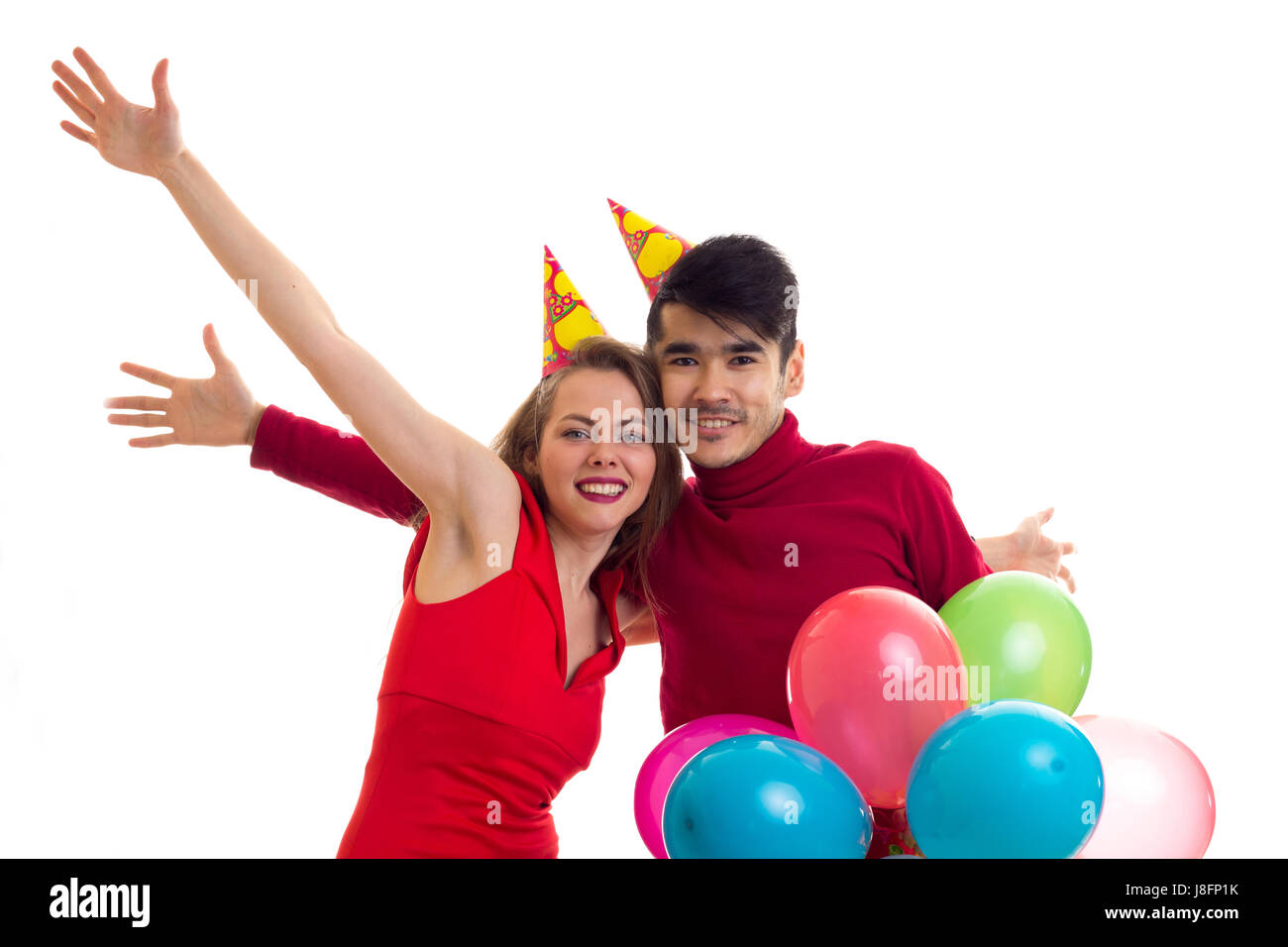 Young happy woman with long chestnut hair in red dress and young ...