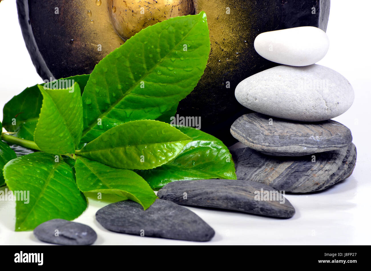 wellness gong stones Stock Photo - Alamy