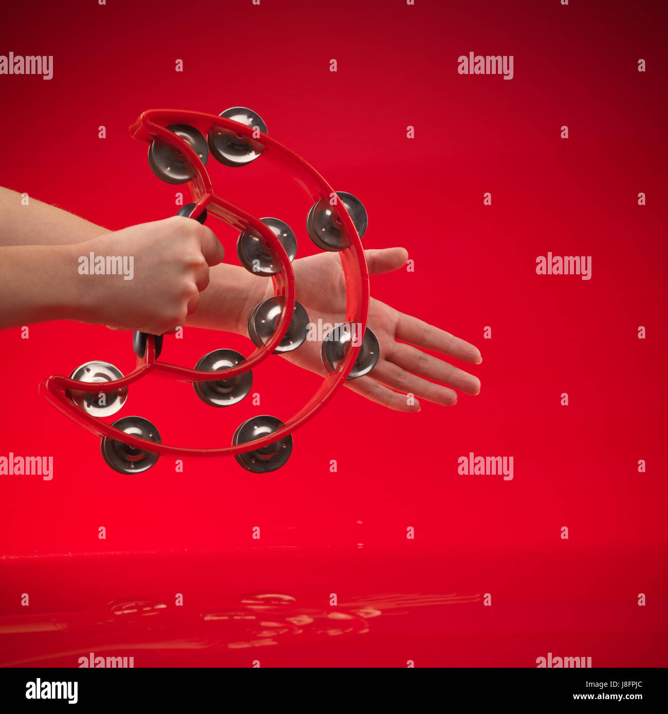 Musician shaking percussion instrument hi-res stock photography and ...