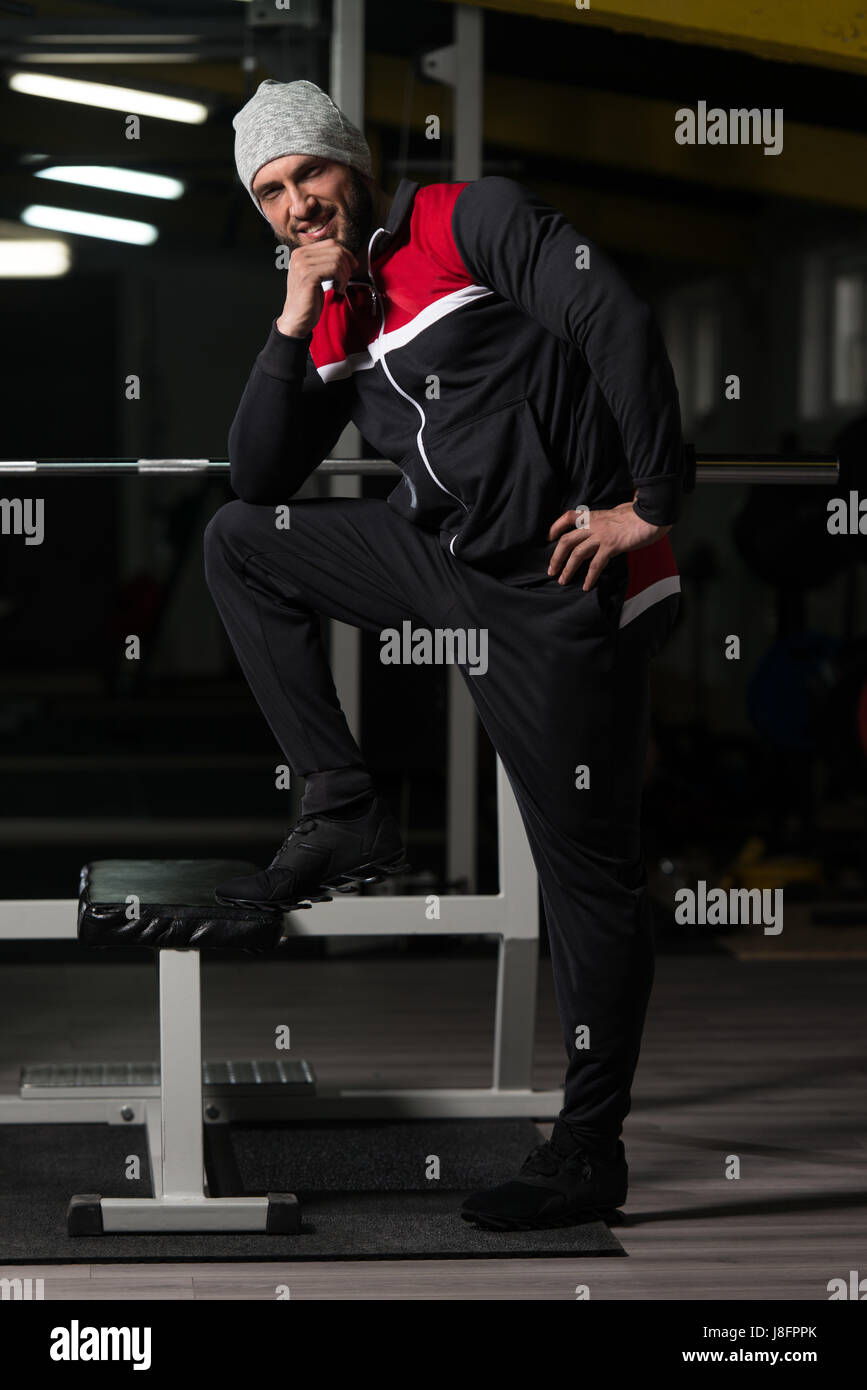 Gym weights track suit hi-res stock photography and images - Alamy