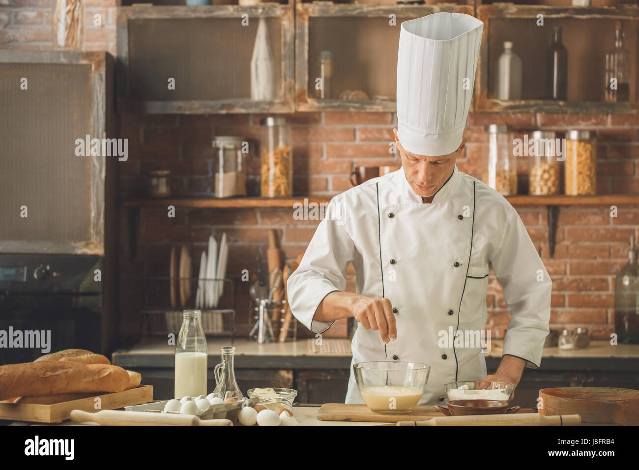 Adding pinch of salt hi-res stock photography and images - Alamy