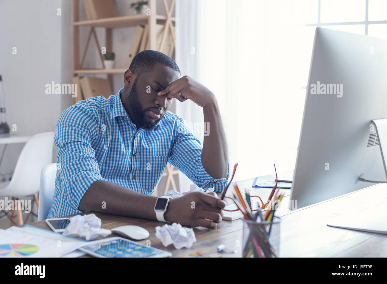 Young african man working in the office business Stock Photo - Alamy